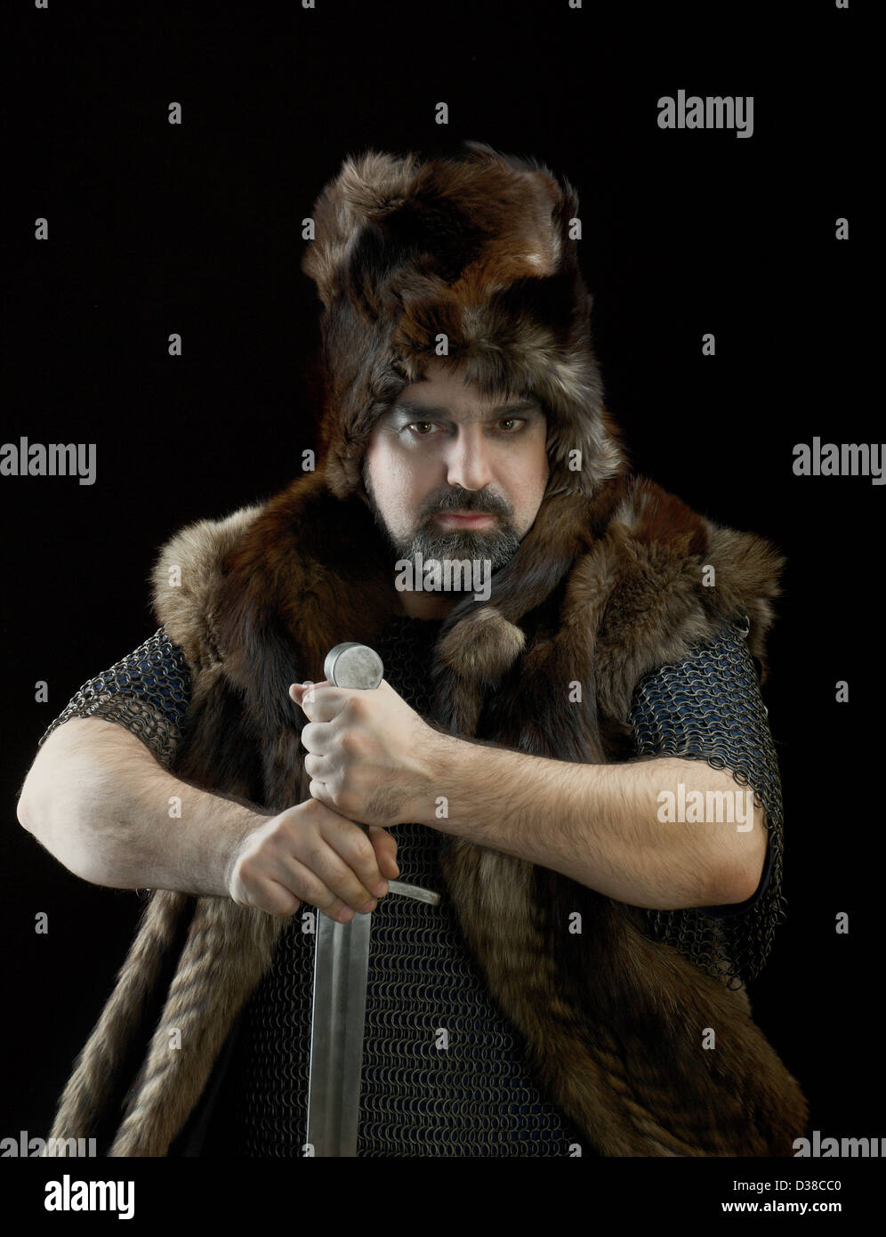 Cimmerian.barbarian Warrior.Medieval knight in the armor with the sword ...