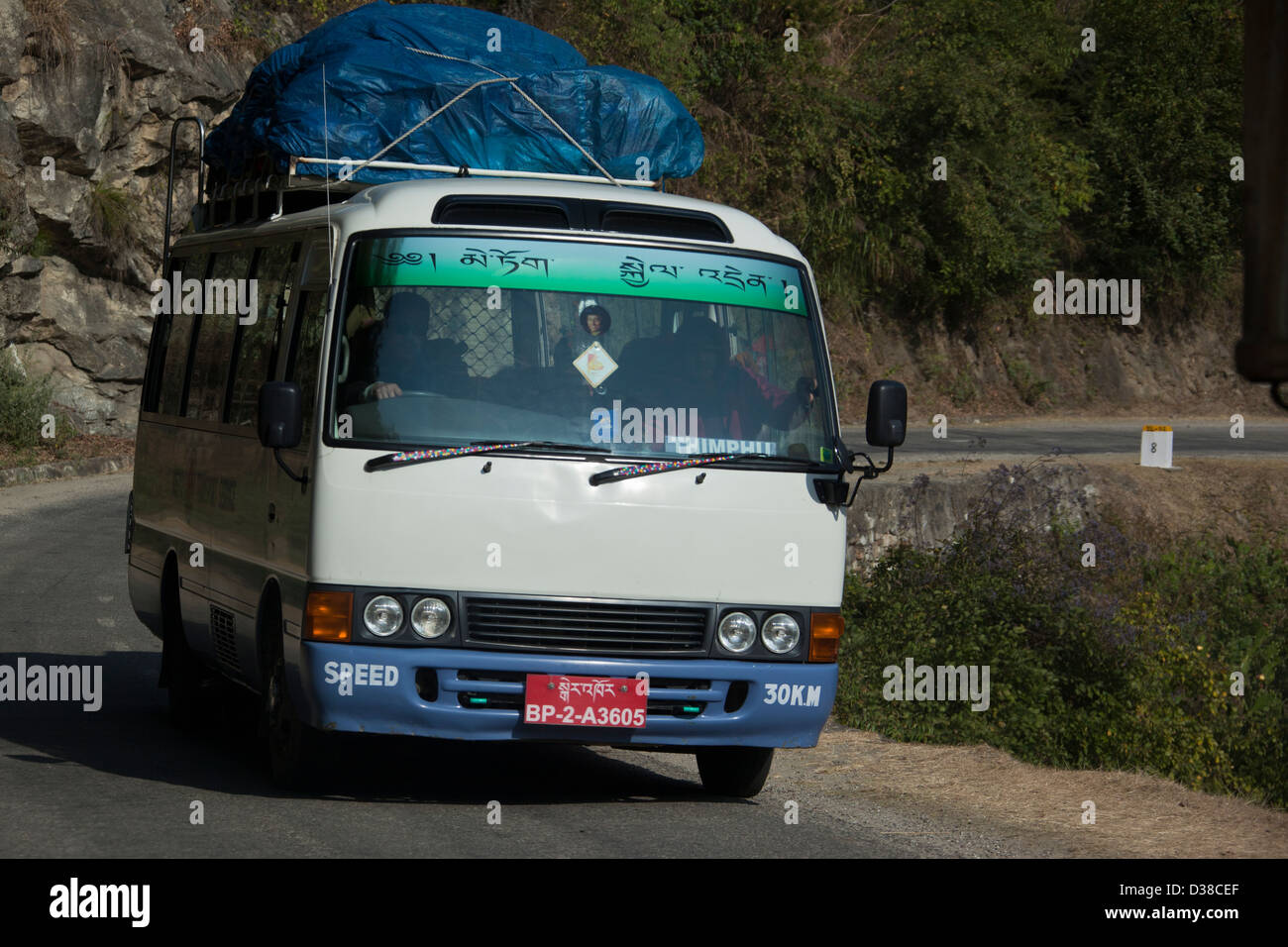 Local passenger bus on the national highway, Bhutan Stock Photo - Alamy