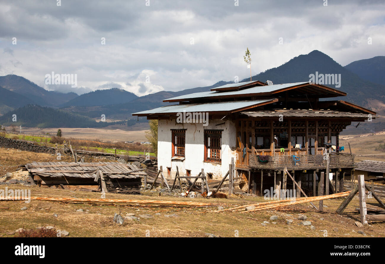 Rural house within fields of the Phobjika valley, Wangdiphodrang ...