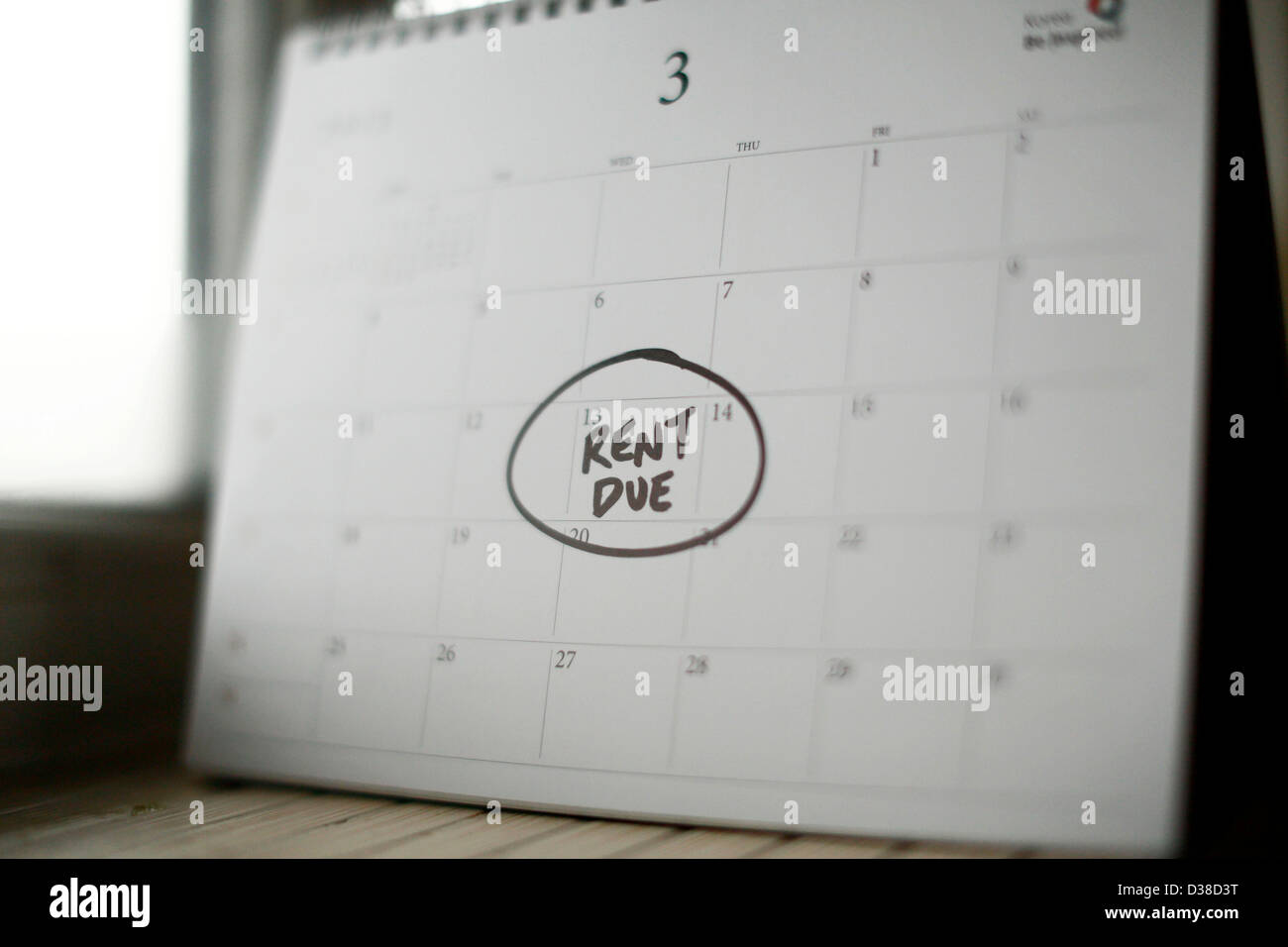 Rent due circled on a calendar Stock Photo - Alamy