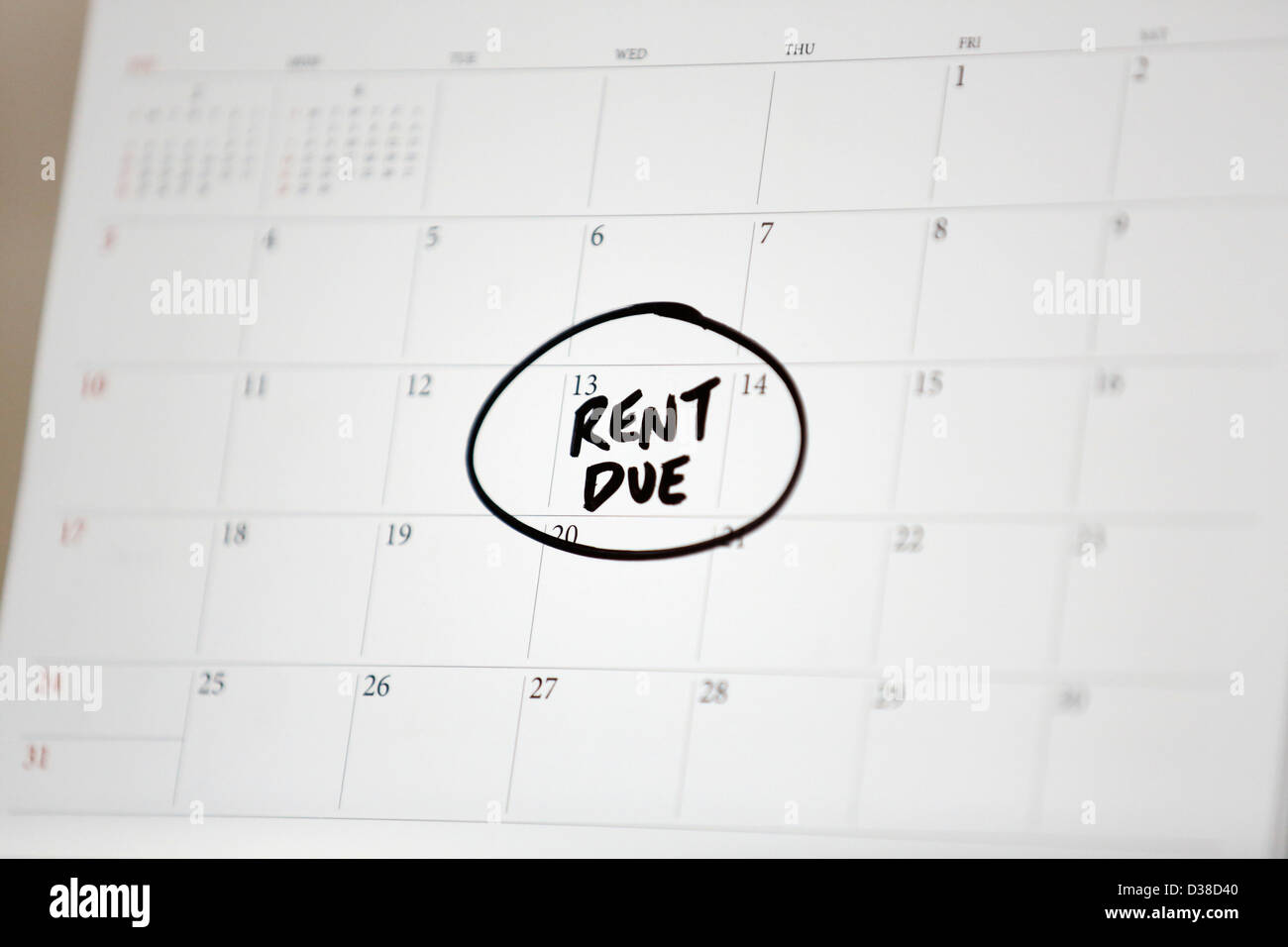 Rent due circled on a calendar Stock Photo - Alamy