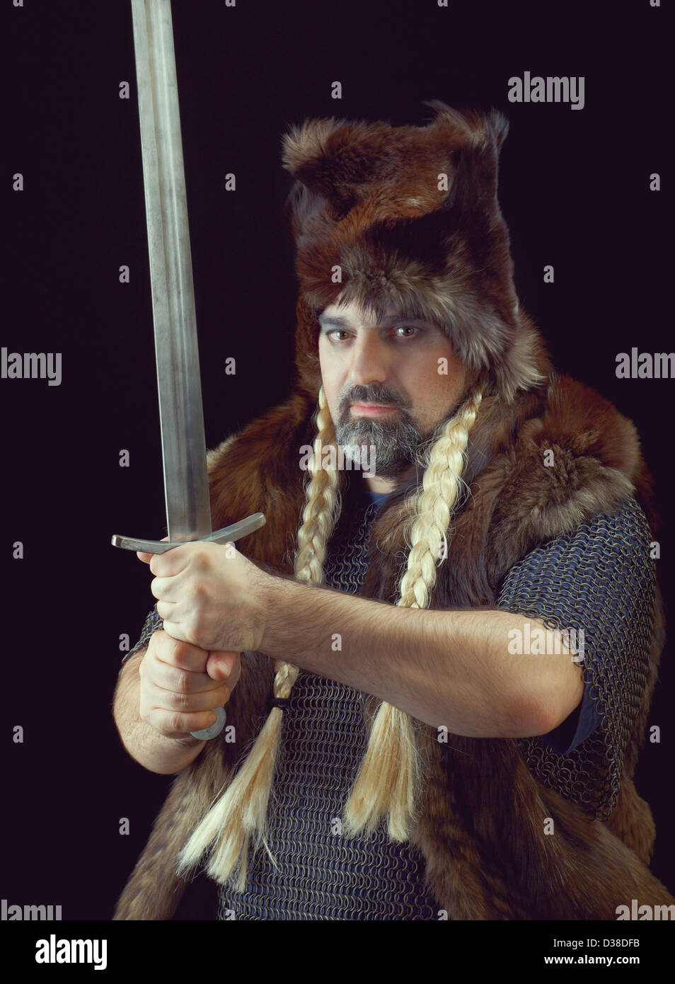 Cimmerian.barbarian Warrior.Medieval knight in the armor with the sword ...