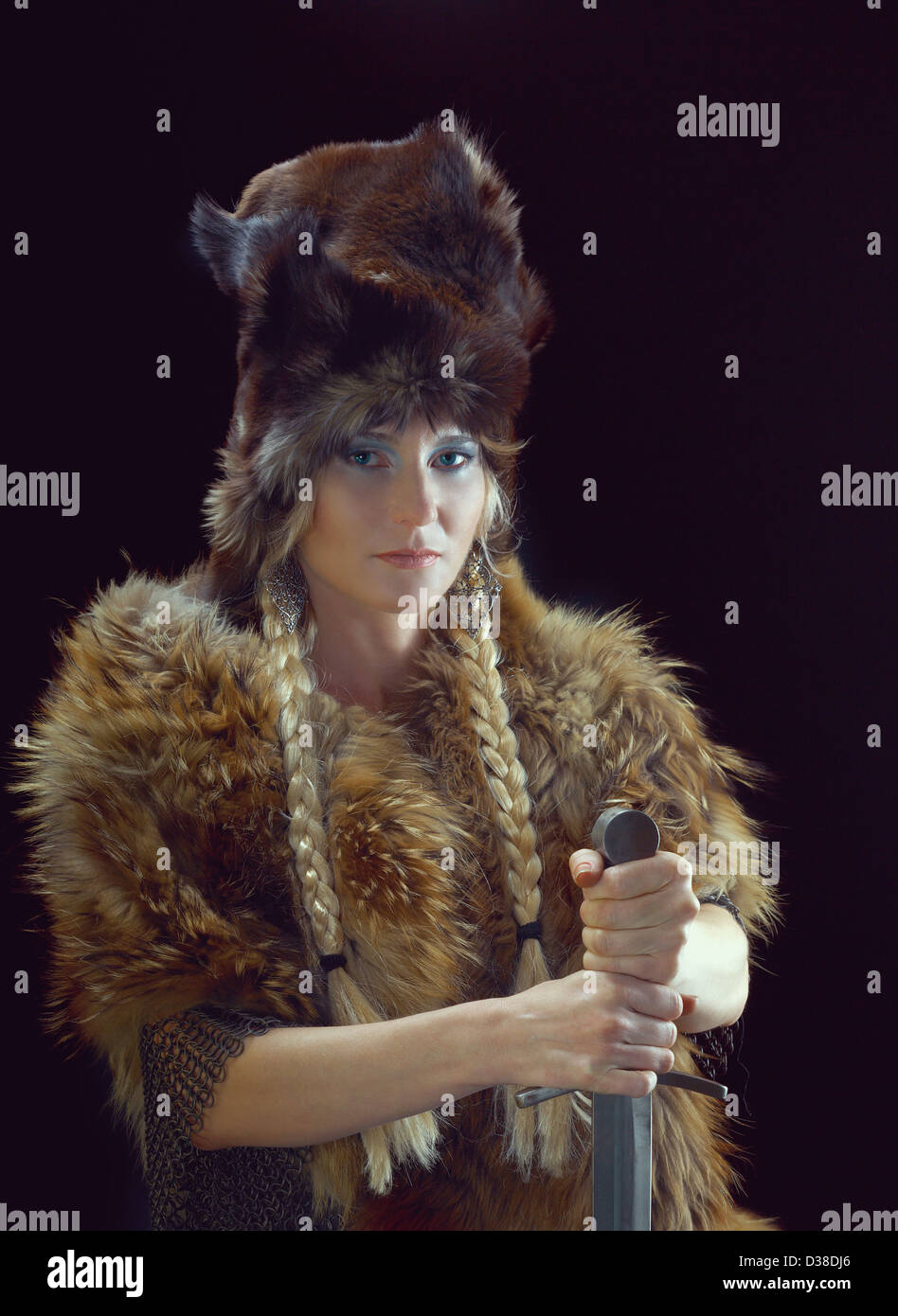 Valkyrie.Viking girl with sword Stock Photo - Alamy