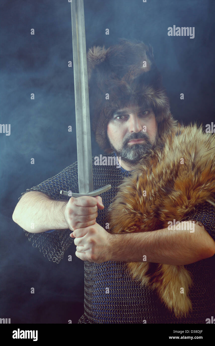 Cimmerian.barbarian Warrior.Medieval knight in the armor with the sword ...
