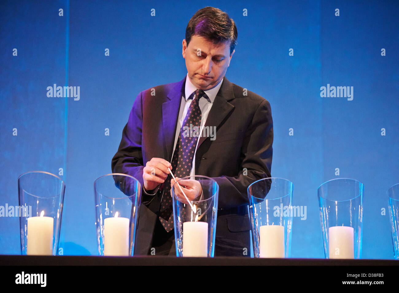 Douglas Alexander MP (pictured) lights a candle at the Holocaust ...