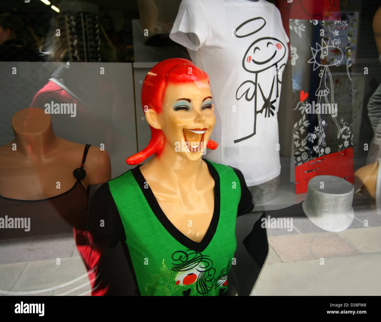 Dummy in a show-window of shop Stock Photo - Alamy