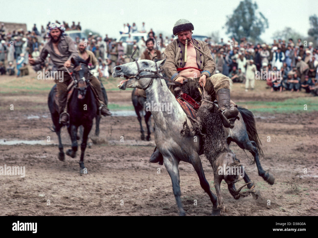 Afghan refugees playing their traditional game of Buzkashi. Peshawar ...