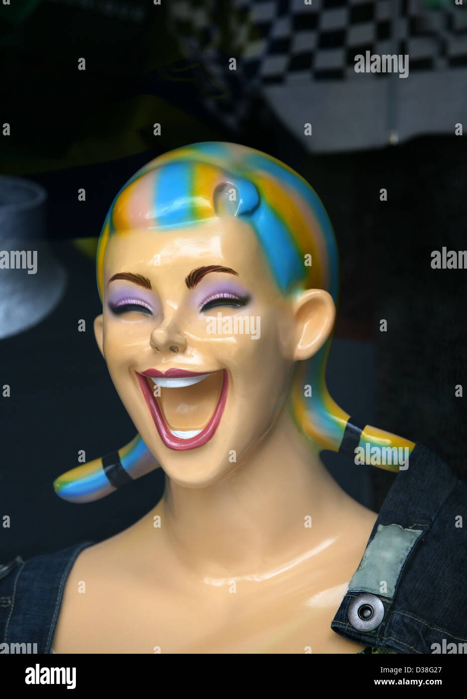 Dummy in a show-window of shop Stock Photo - Alamy