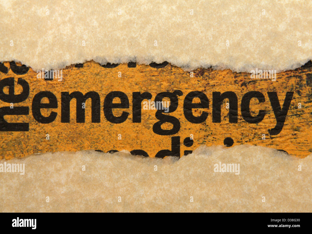 Emergency text on paper hole Stock Photo - Alamy