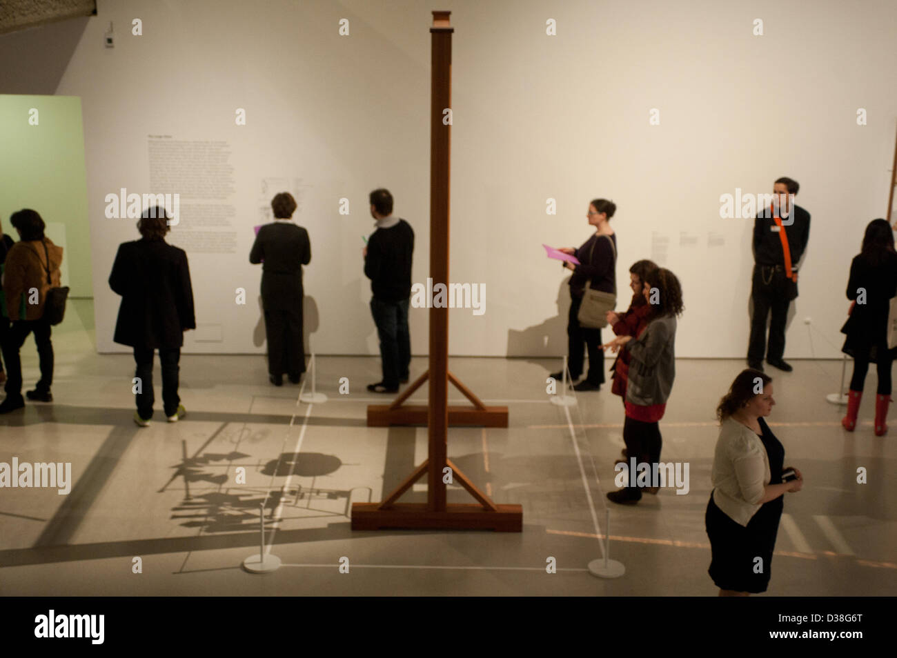 London, UK - 13 February 2013: visitors looks up at Marcel Duchamp's ...