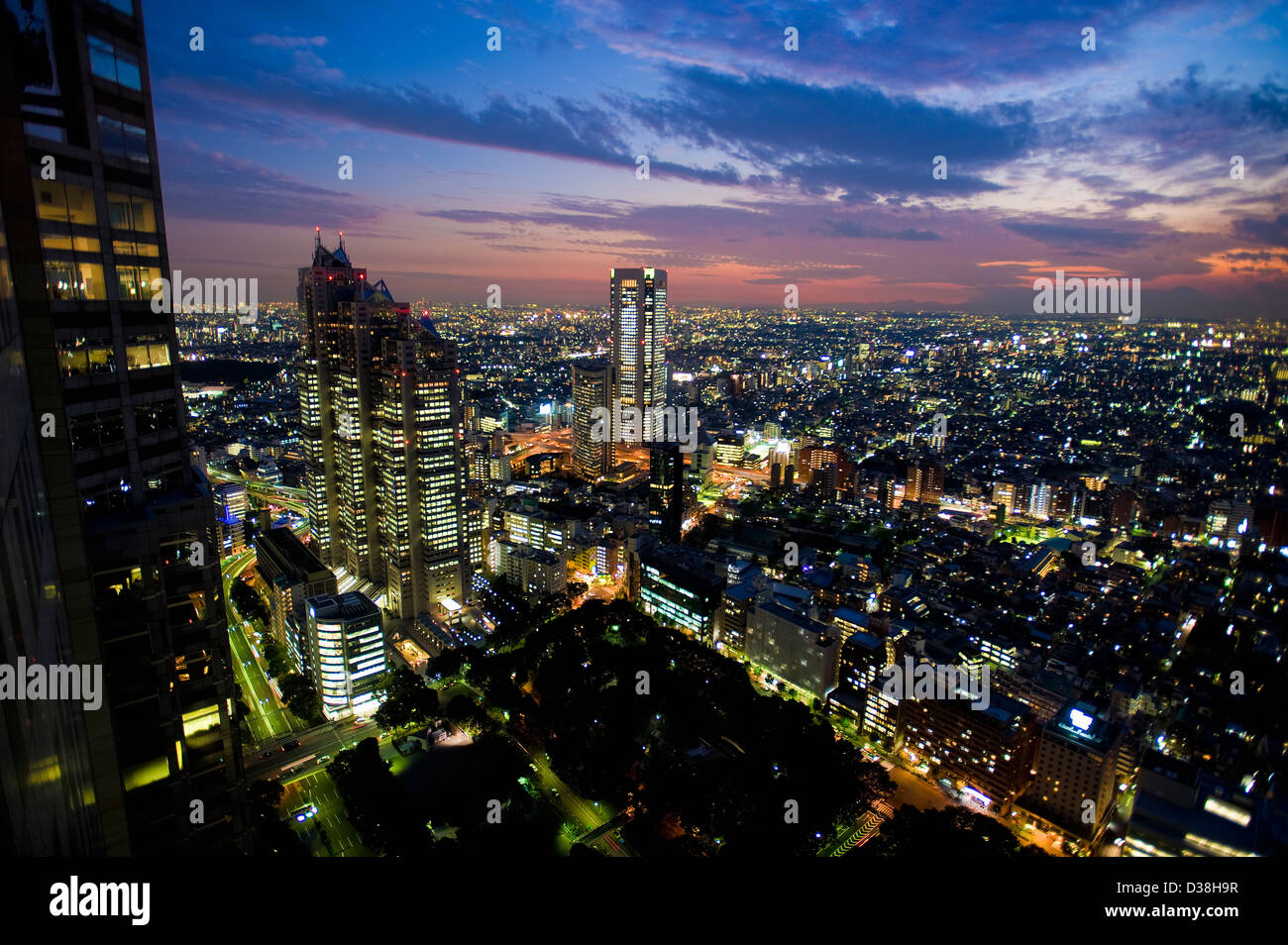 Aerial view of cityscape lit up at night Stock Photo - Alamy