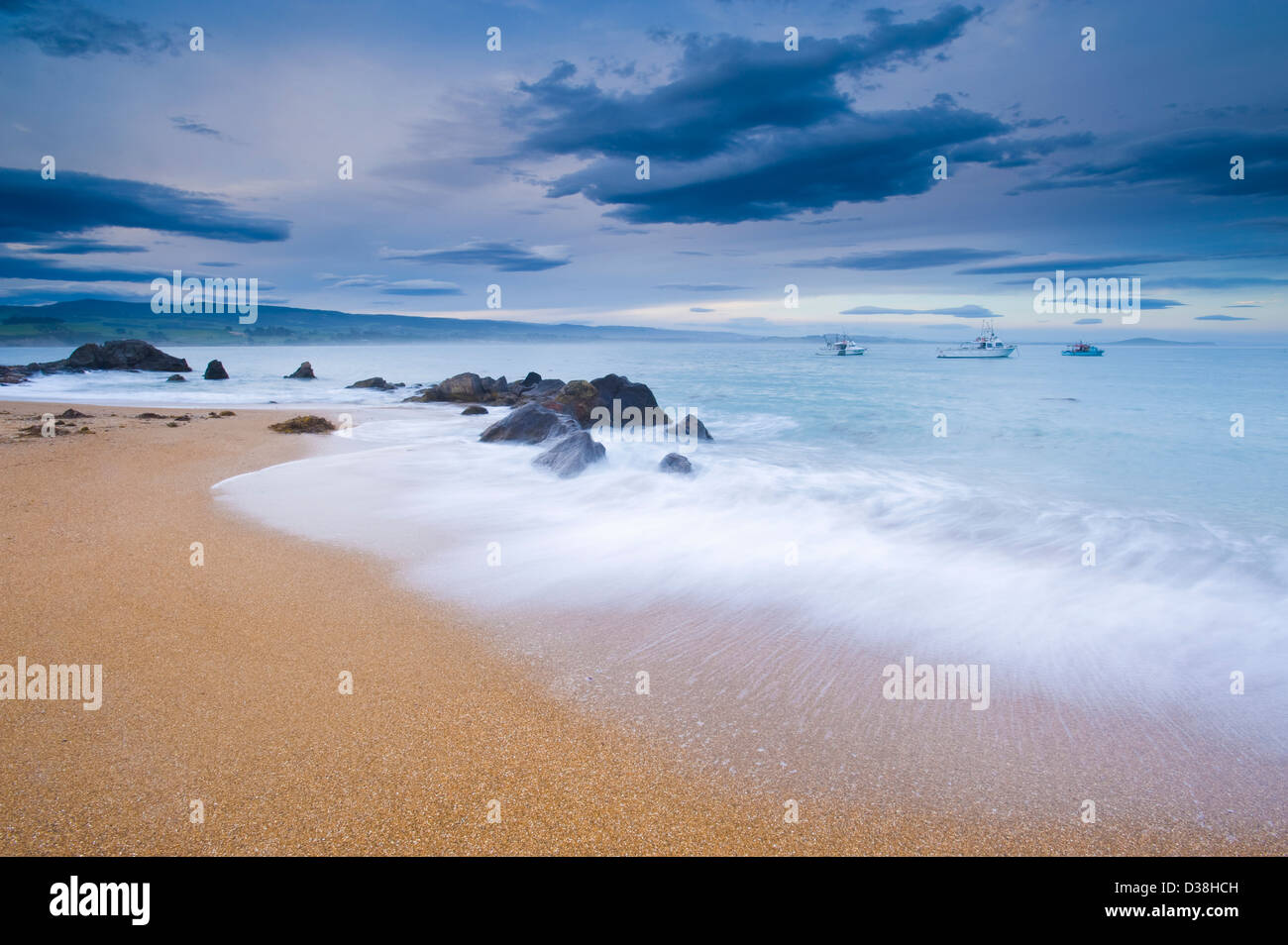 Wave washing on shore blurred motion Stock Photo - Alamy