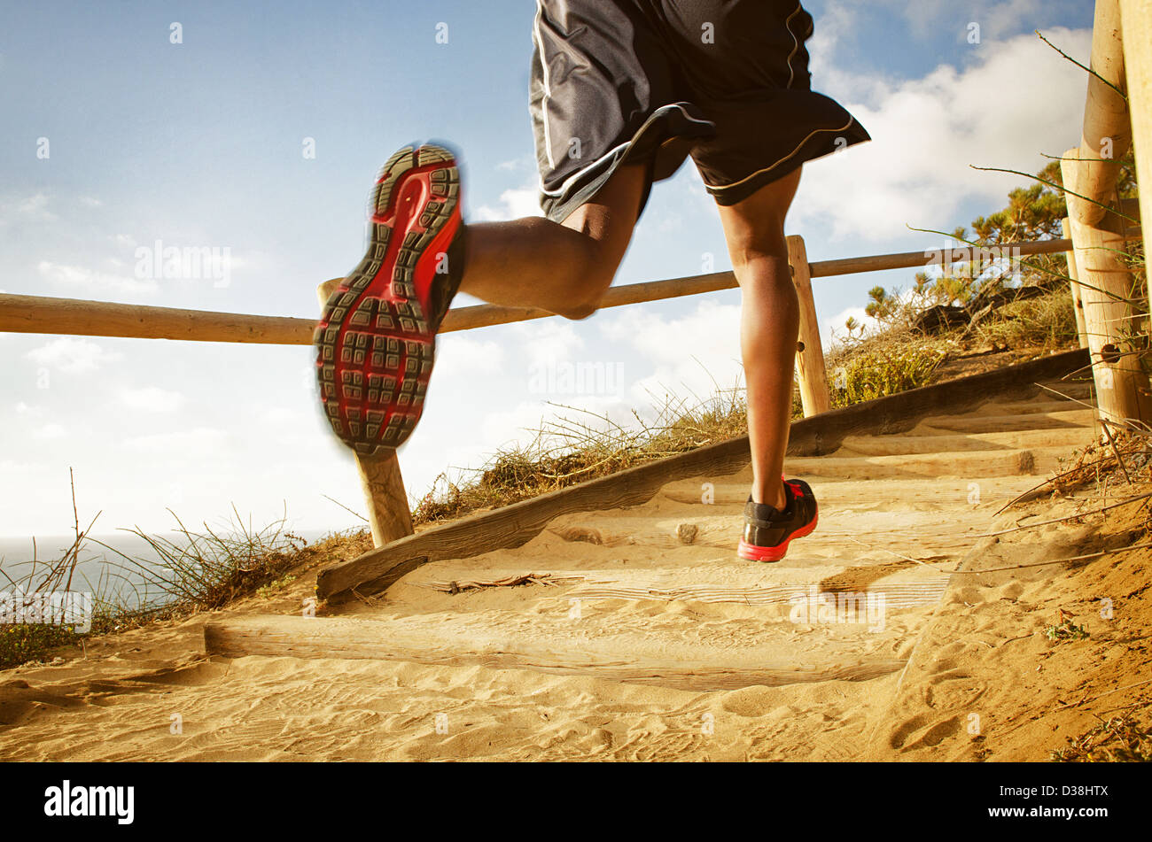 Man running on dirt path Stock Photo - Alamy
