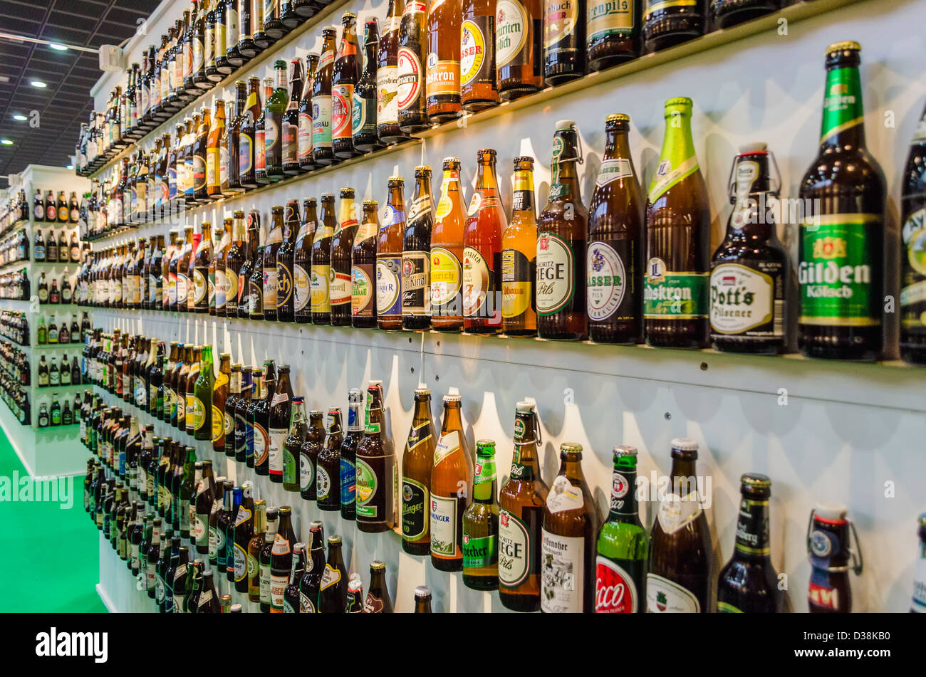 Variety of beer bottles on shelves at Green Week in Berlin, Germany ...
