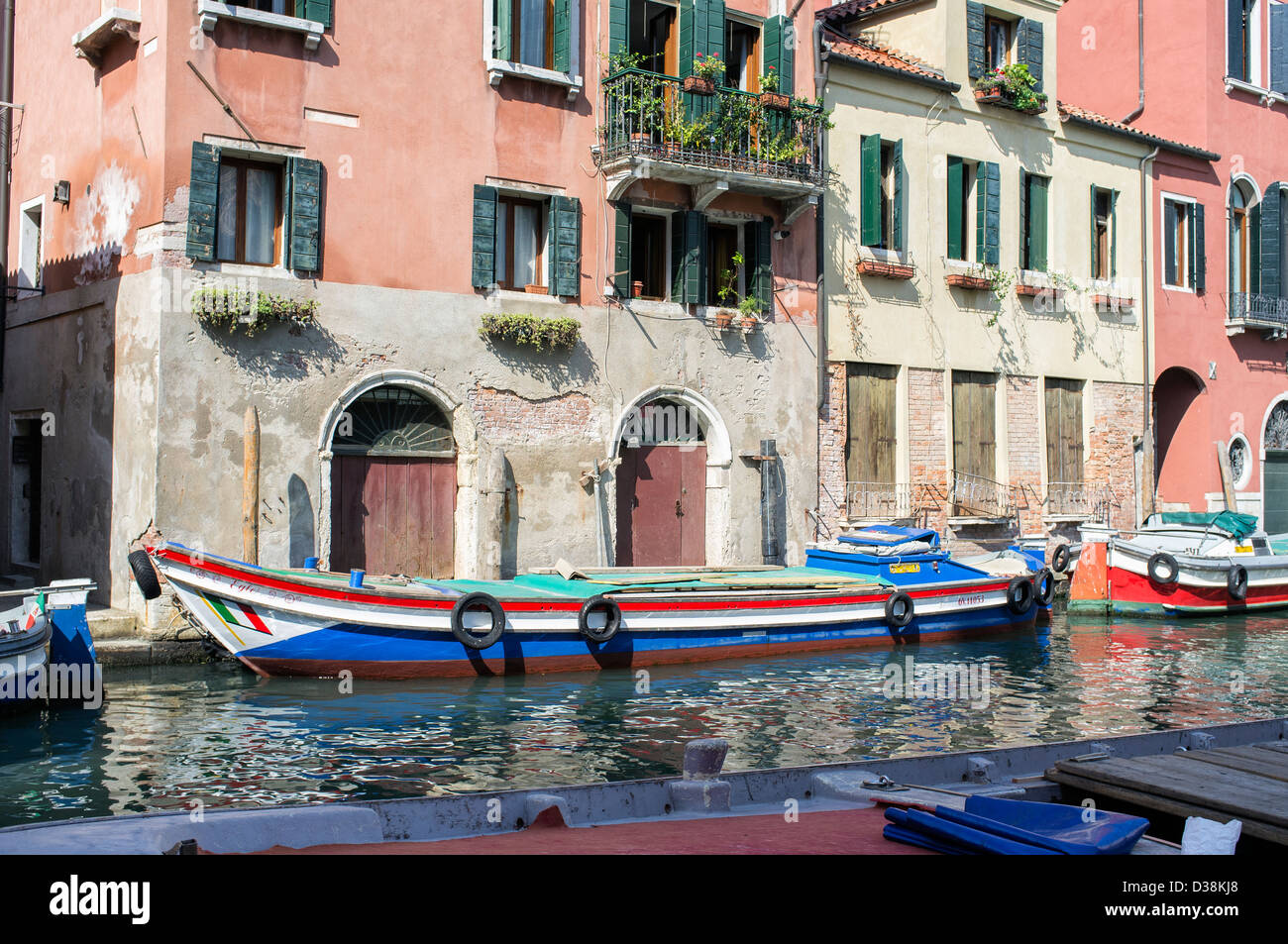Colourful Boat and Faded Buildings in Castello District of Venice Stock ...