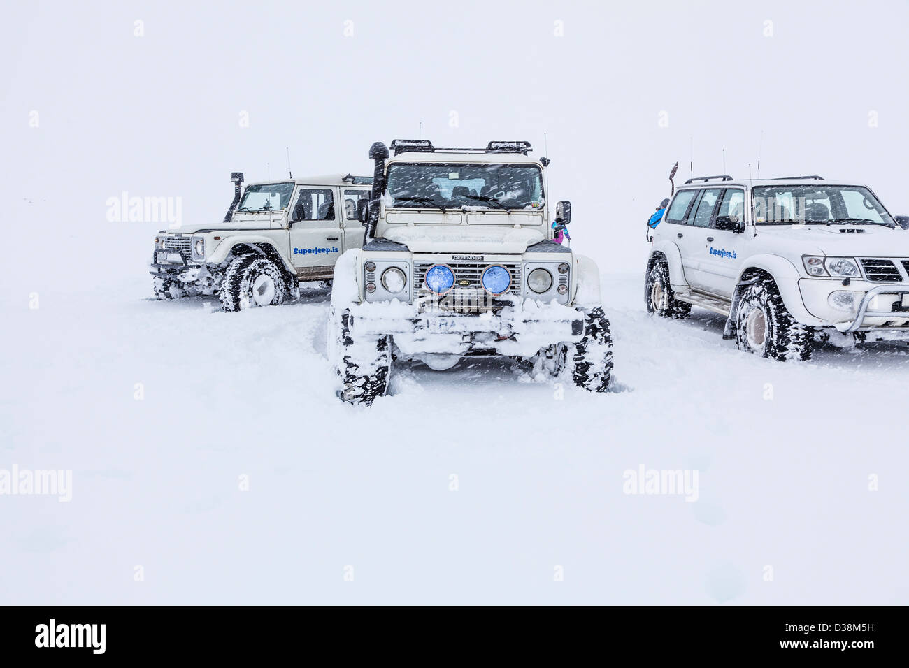 Snowy Land Rover Defender 4v4 4WD vehicles in heavy snow frozen ...