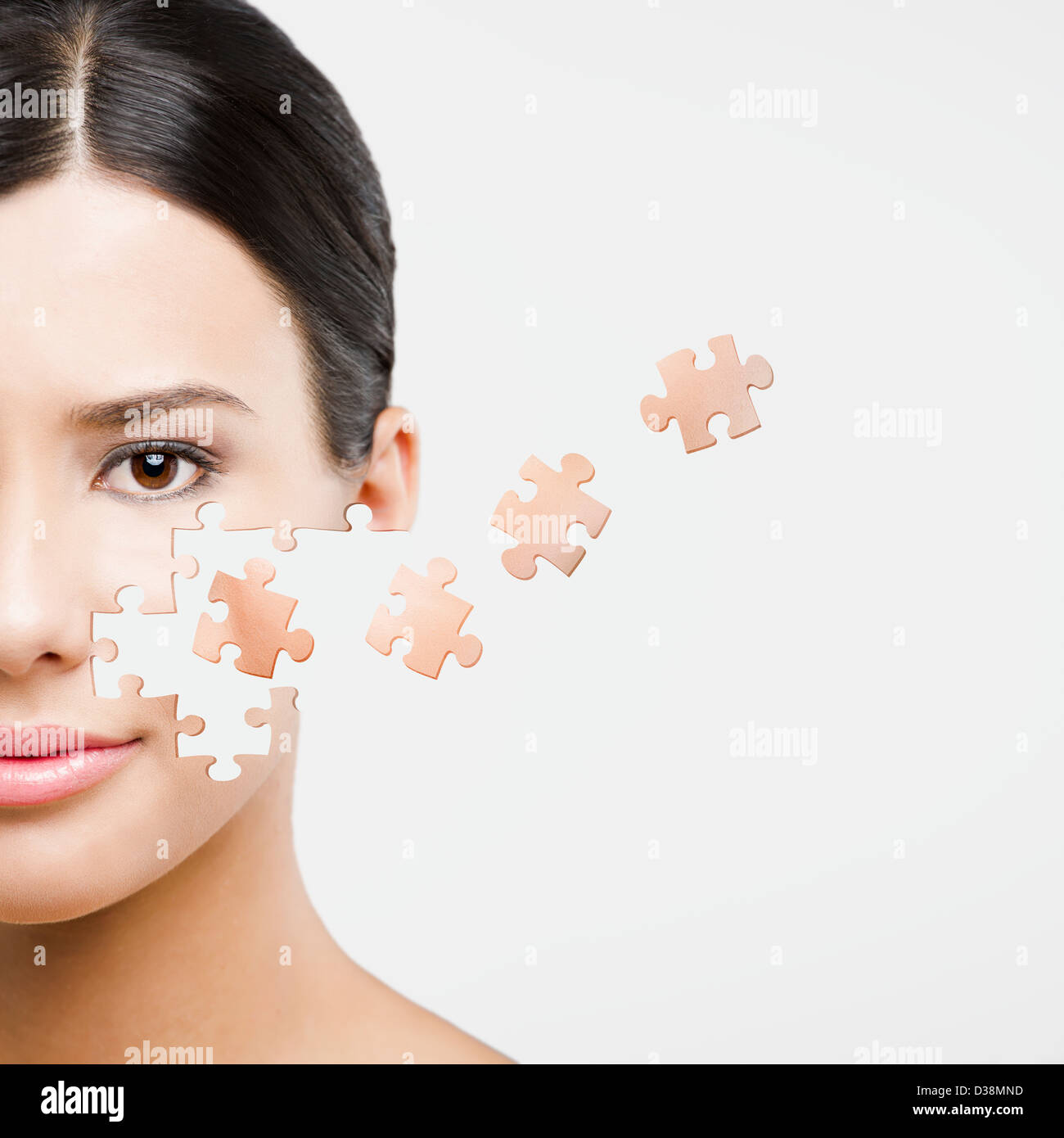 Beauty concept of a beautiful Asian woman with puzzle pieces in the ...
