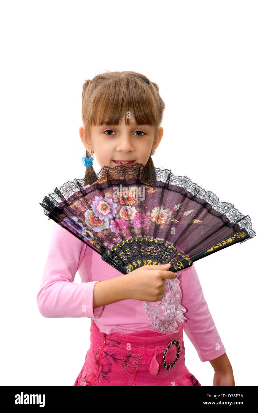 The girl in pink clothes covers the face with a fan Stock Photo - Alamy