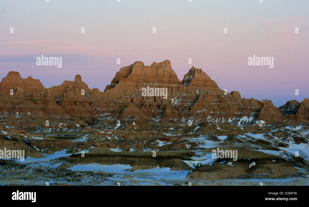 Snow covers the rugged terrain of Badlands National Park in South ...