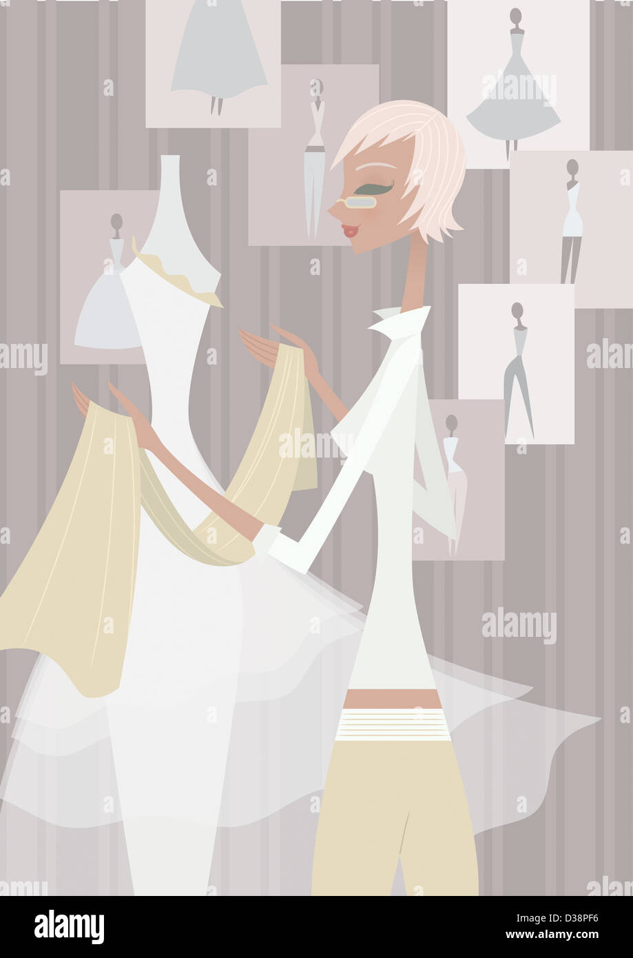Female fashion designer in a boutique Stock Photo - Alamy