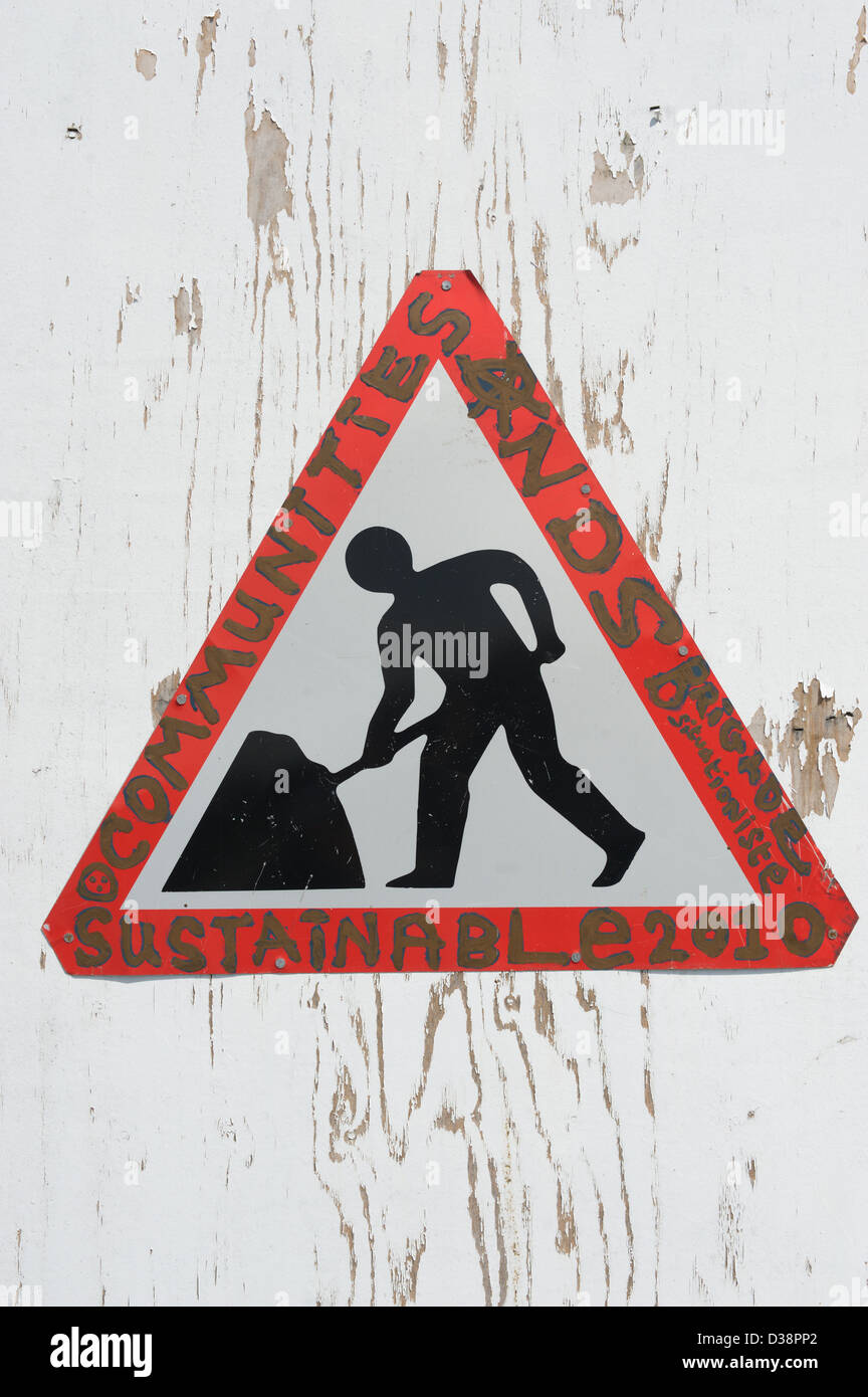 Altered road sign, with words added Sustainable Communities Stock Photo ...