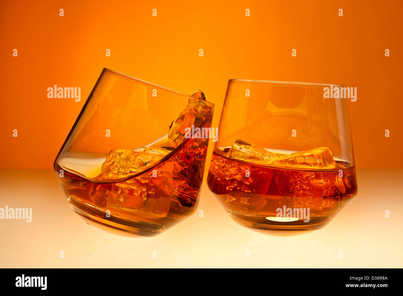 Two whisky glasses cheers hi-res stock photography and images - Alamy