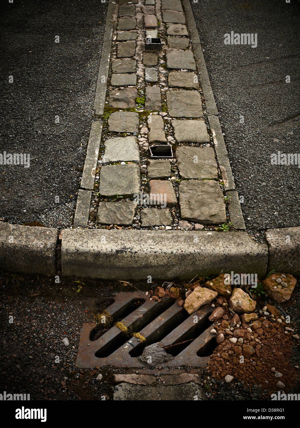 Manhole in street Stock Photo - Alamy