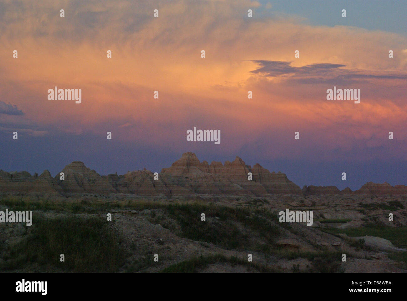 A stunning sunset over the Badlands National Park in South Dakota ...