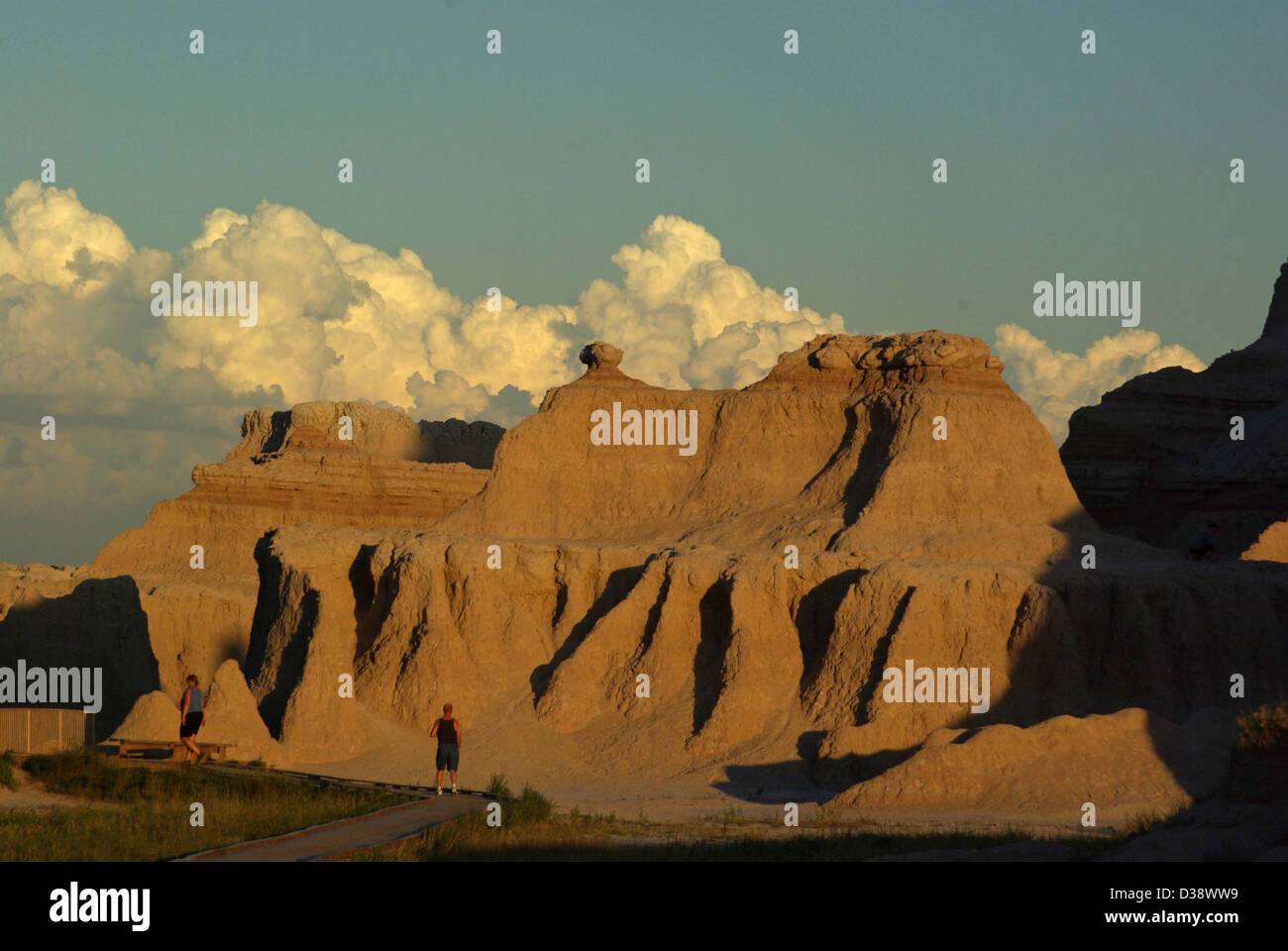 A hoodoo, a unique rock formation, sits atop a butte in Badlands ...