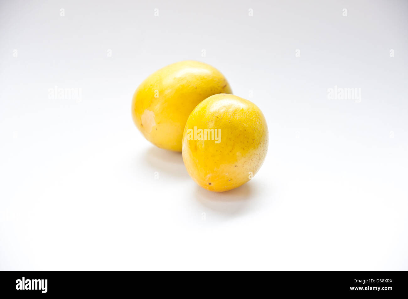 monkey apple fruit on white background Stock Photo - Alamy