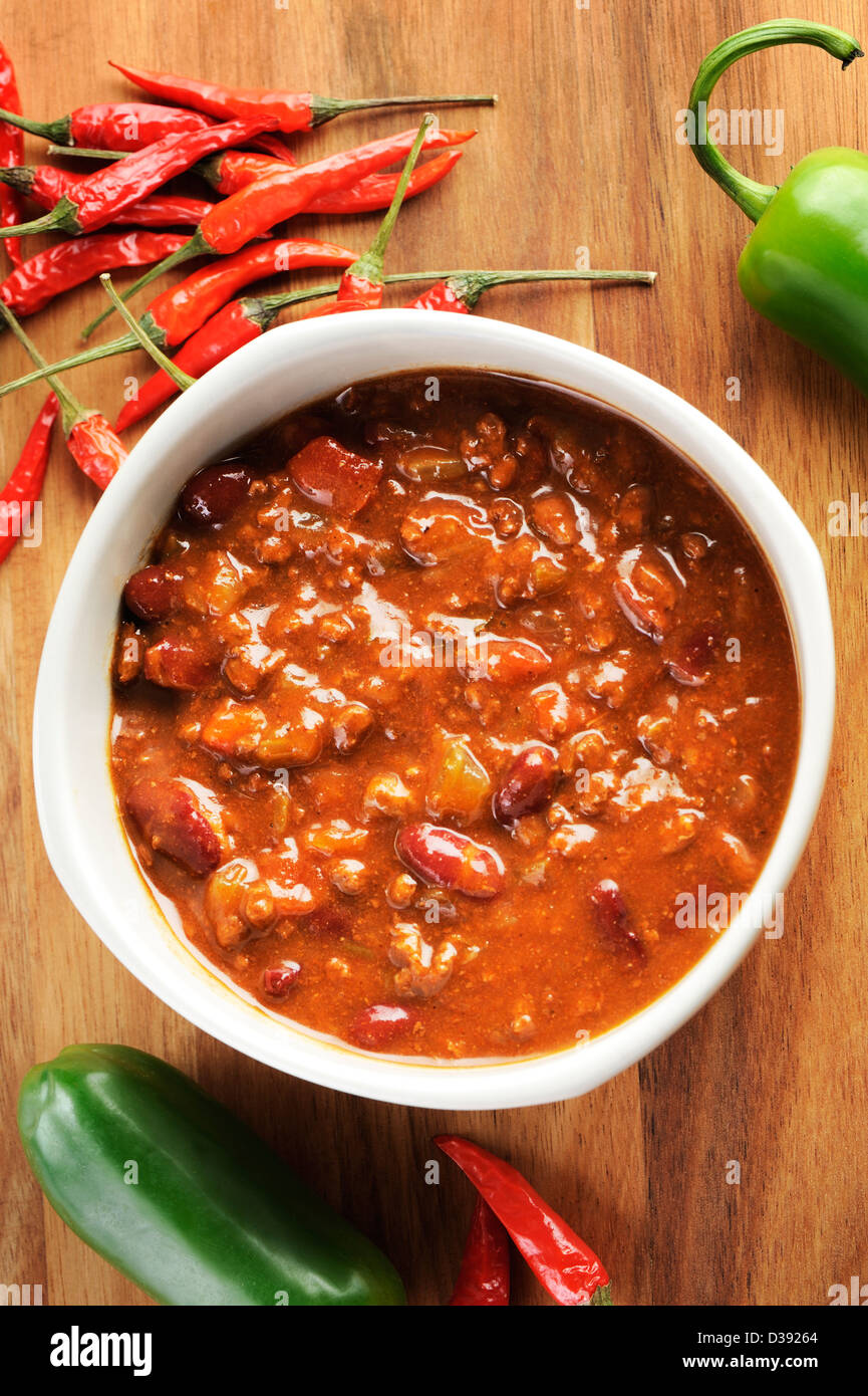 bowl of red hot chili with ground beef, beans and legumes Stock Photo ...