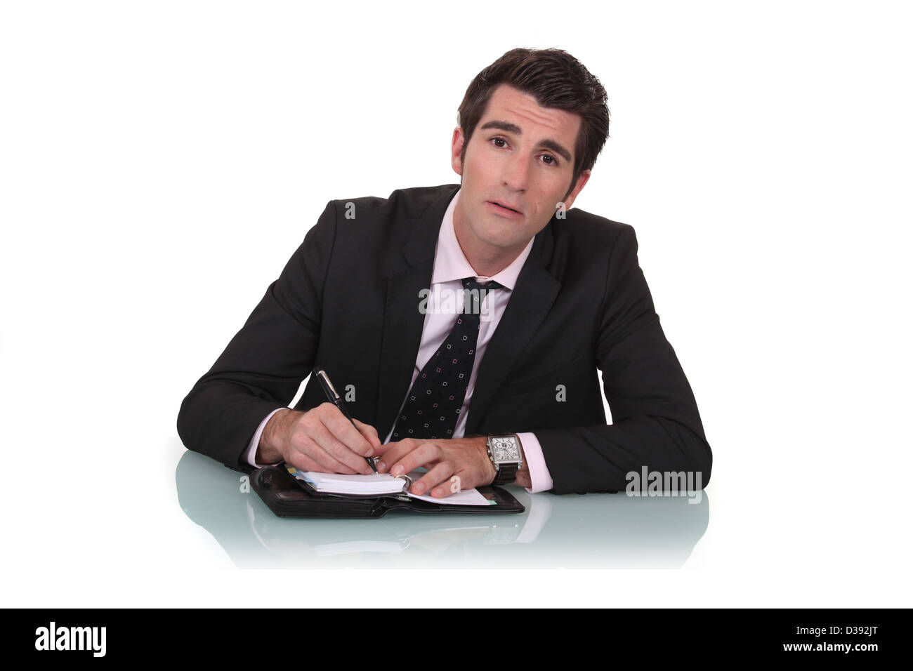 Businessman pen in paper Cut Out Stock Images & Pictures - Alamy