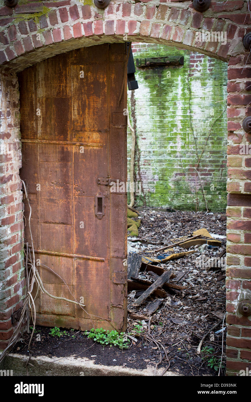The rusted metal doorway to an old abandoned building in Carrollton ...