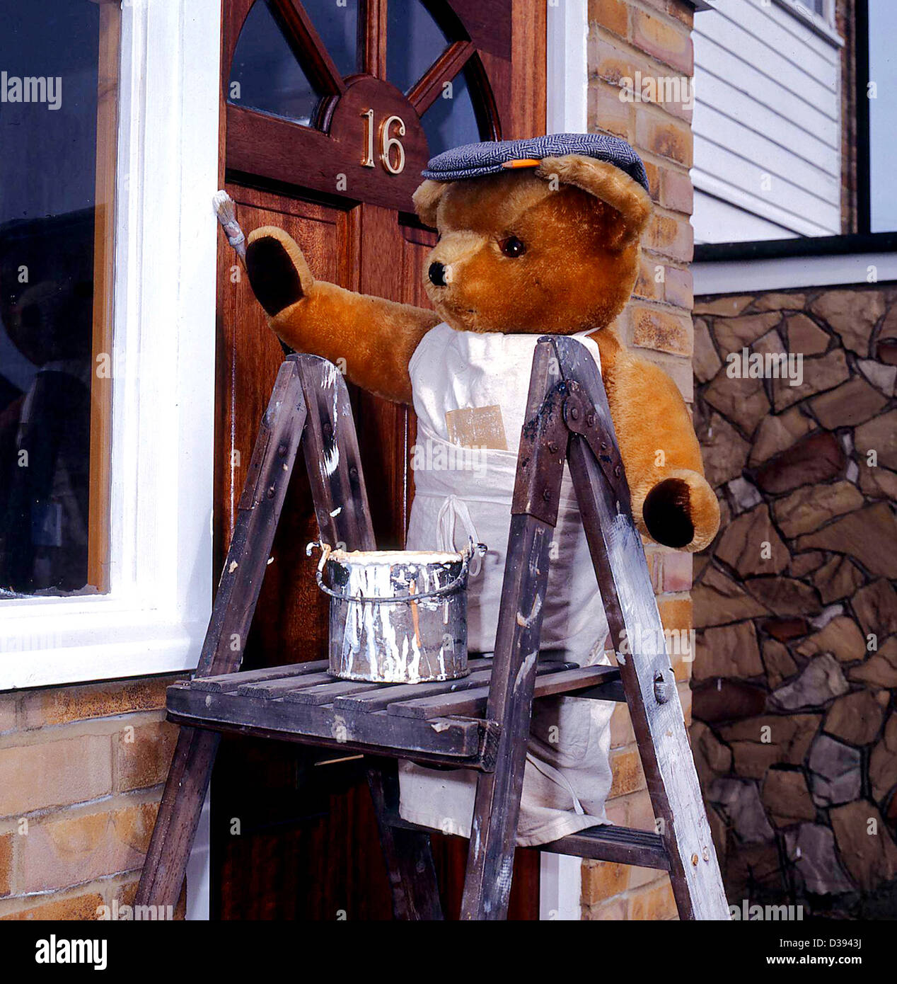 A Teddy Bear 'handyman' painting Stock Photo - Alamy