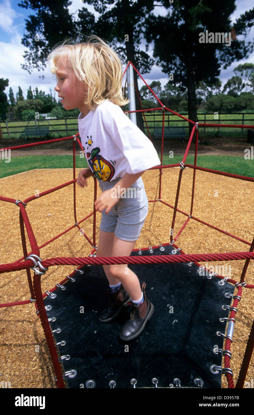 Children, young girl on climbing maze Stock Photo - Alamy
