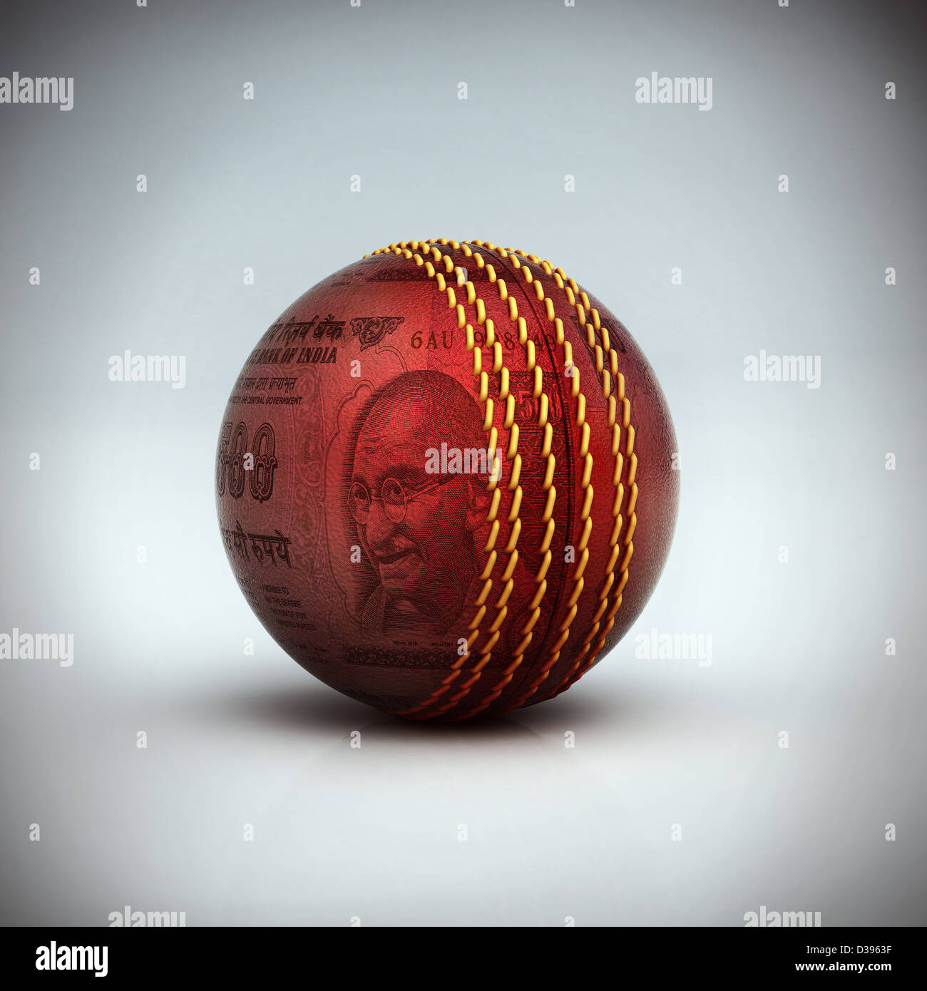 A cricket ball with Indian currency Stock Photo - Alamy