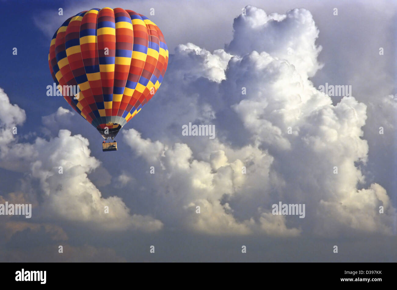 Hot air balloon in stormy sky Stock Photo - Alamy