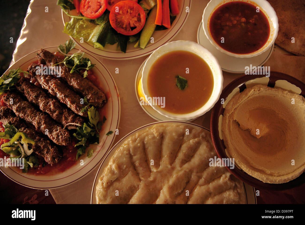 UAE Emirat of Dubai typical arab food Kofta meat on grill Salad Harees ...