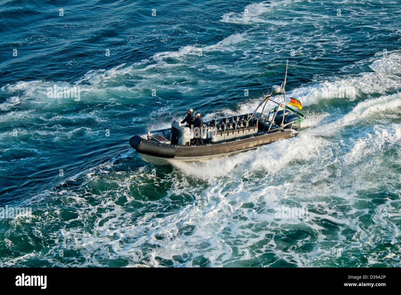 A SWAT -special forces police- inflatable rigid hull (zodiac type) boat ...