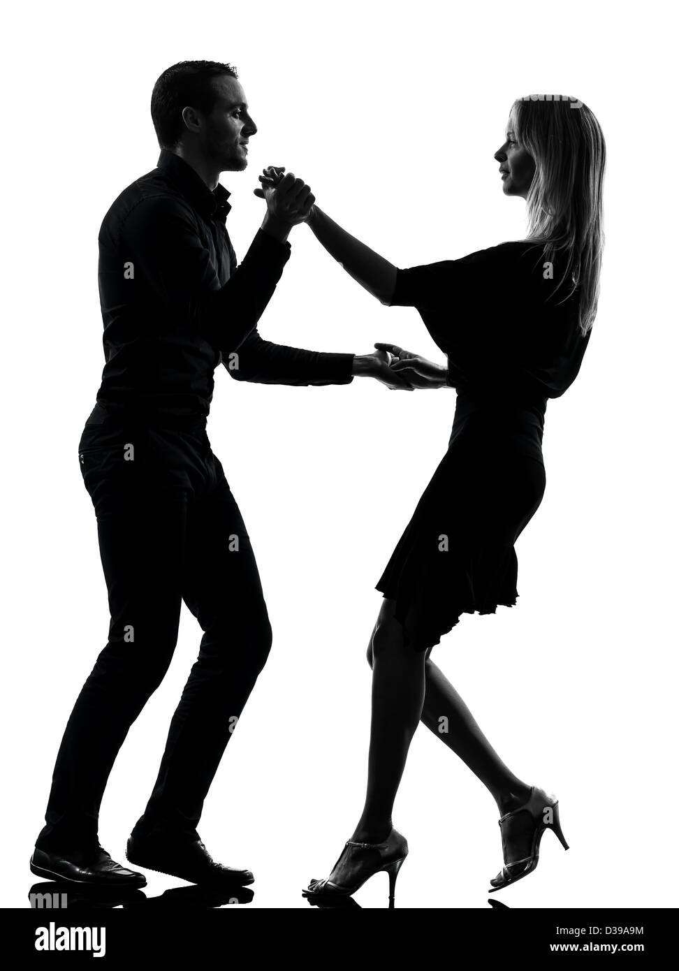 one couple woman man dancing dancers salsa rock in silhouette studio ...