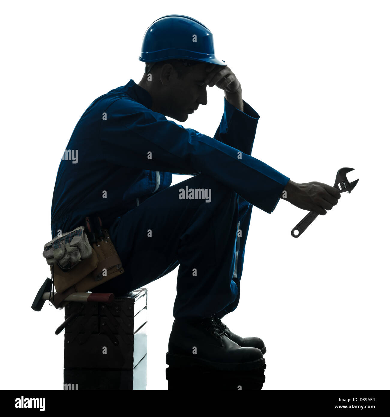 one repairman worker sad fatigue failure silhouette in studio on white ...