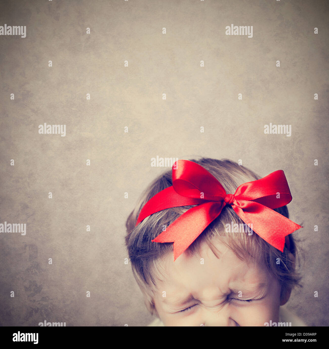 little boy with a red bow Stock Photo - Alamy