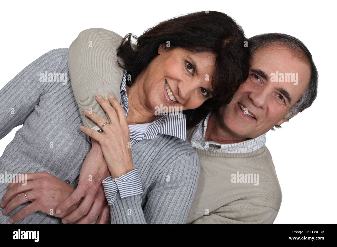 Married couple hugging Stock Photo - Alamy