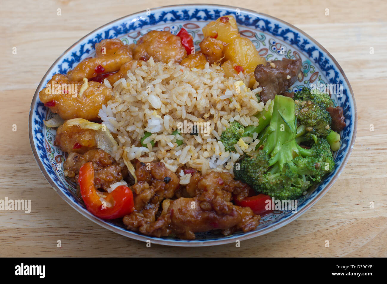 Traditional Chinese food on rice china pattern plates Stock Photo - Alamy