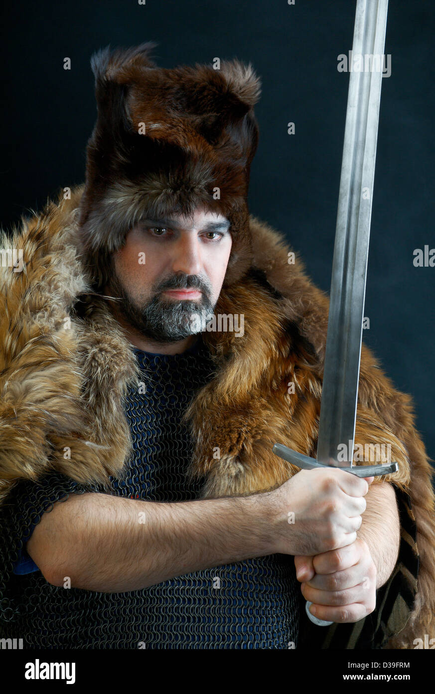 Cimmerian.barbarian Warrior.Medieval knight in the armor with the sword ...