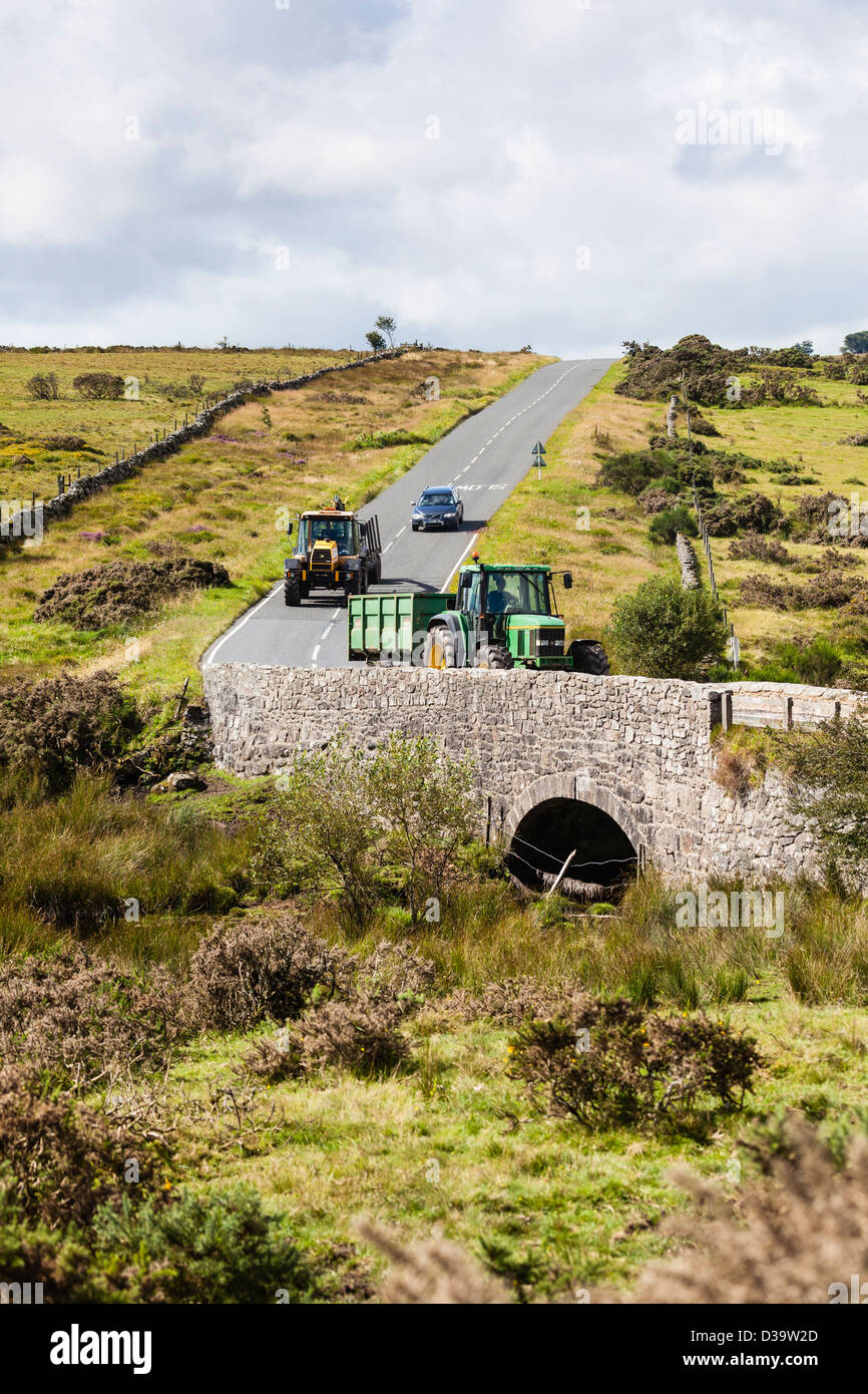Tractors cross Higher Cherry Brook bridge near Two Bridges on on the ...