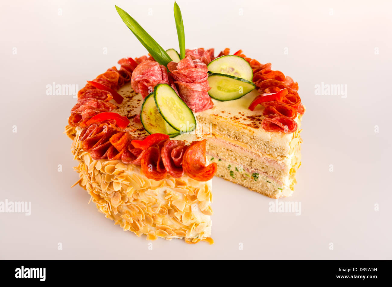 Savory dessert salami pie appetizer almond cake pastry Stock Photo - Alamy