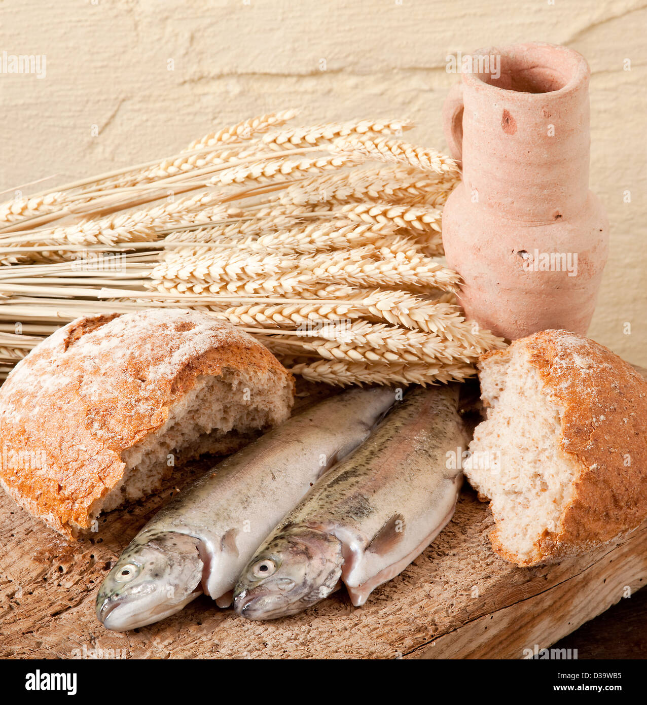 Wine, wheat, bread and fish as symbols of religion Stock Photo - Alamy