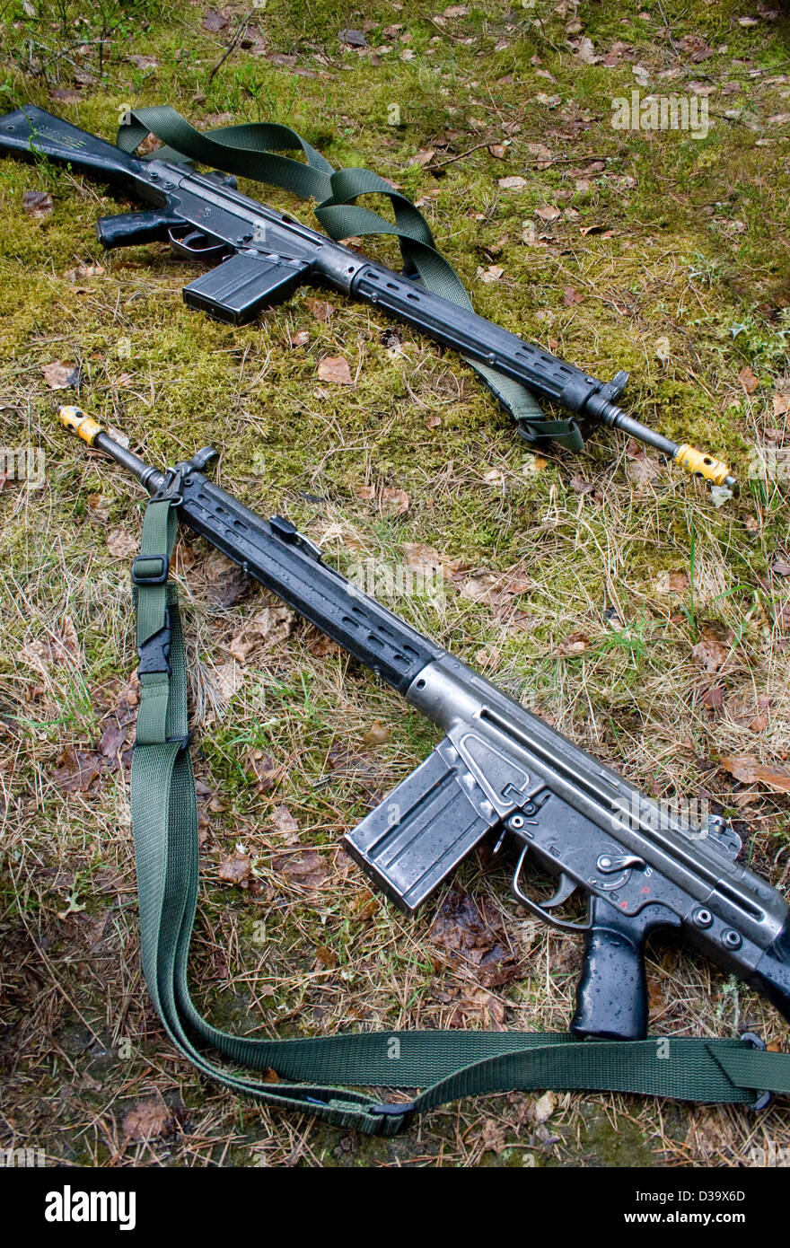 2 AK4's automatic rifles on the ground Stock Photo - Alamy