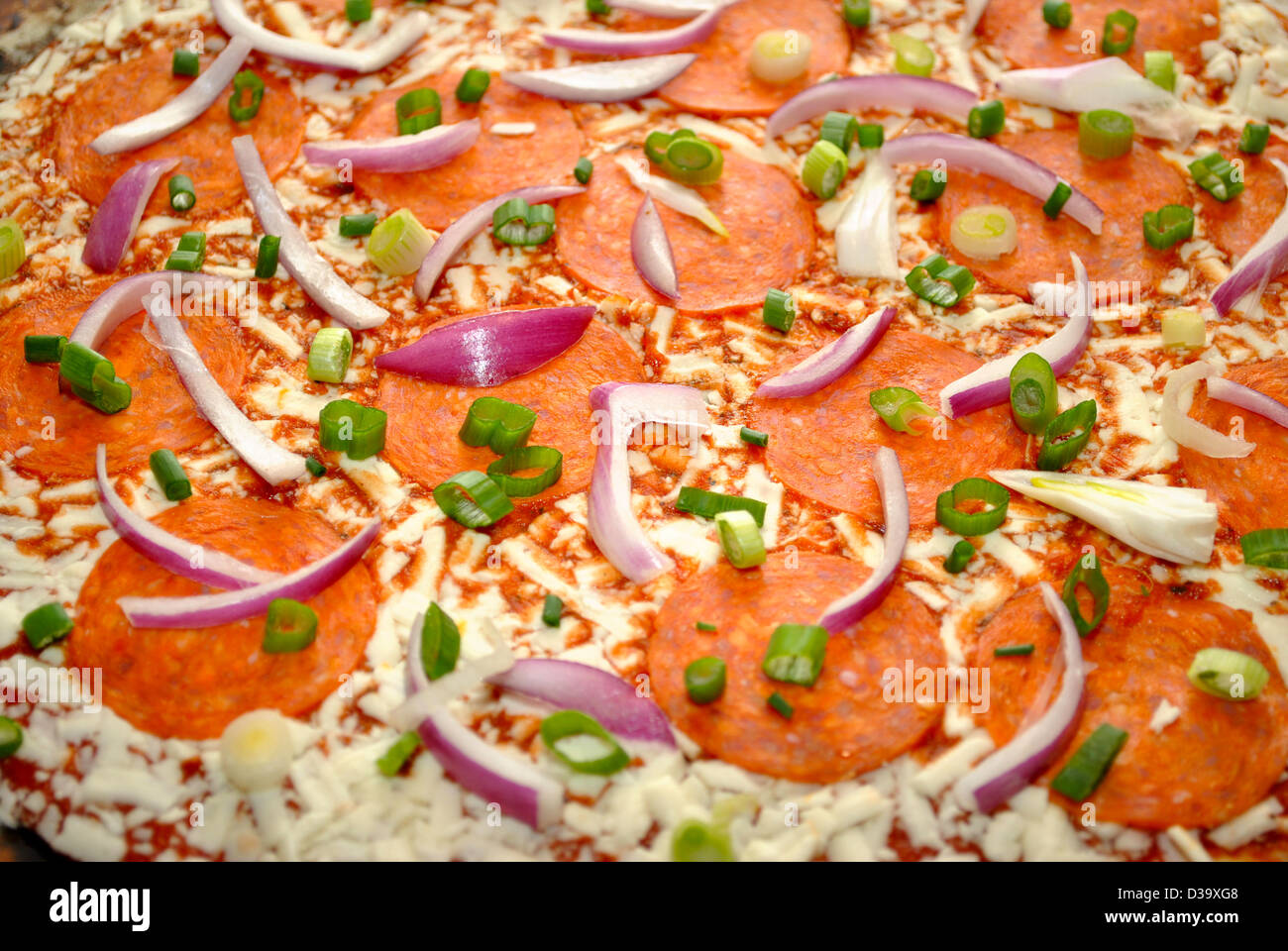 Raw Onion and Pepperoni Pizza Stock Photo - Alamy
